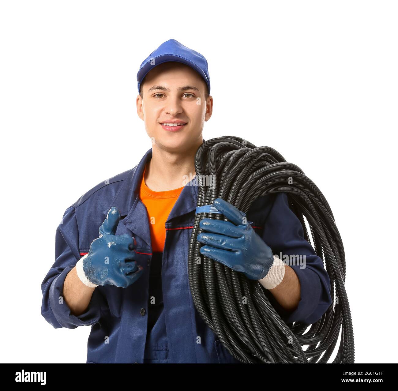 Young electrician with cables on white background Stock Photo - Alamy
