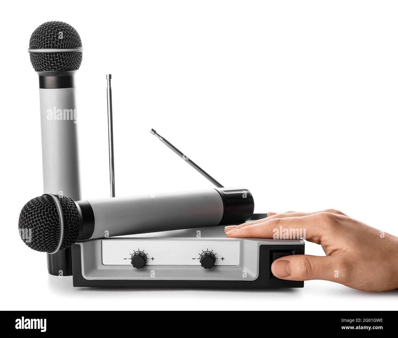 Female hand with modern microphones and audio system on white ...