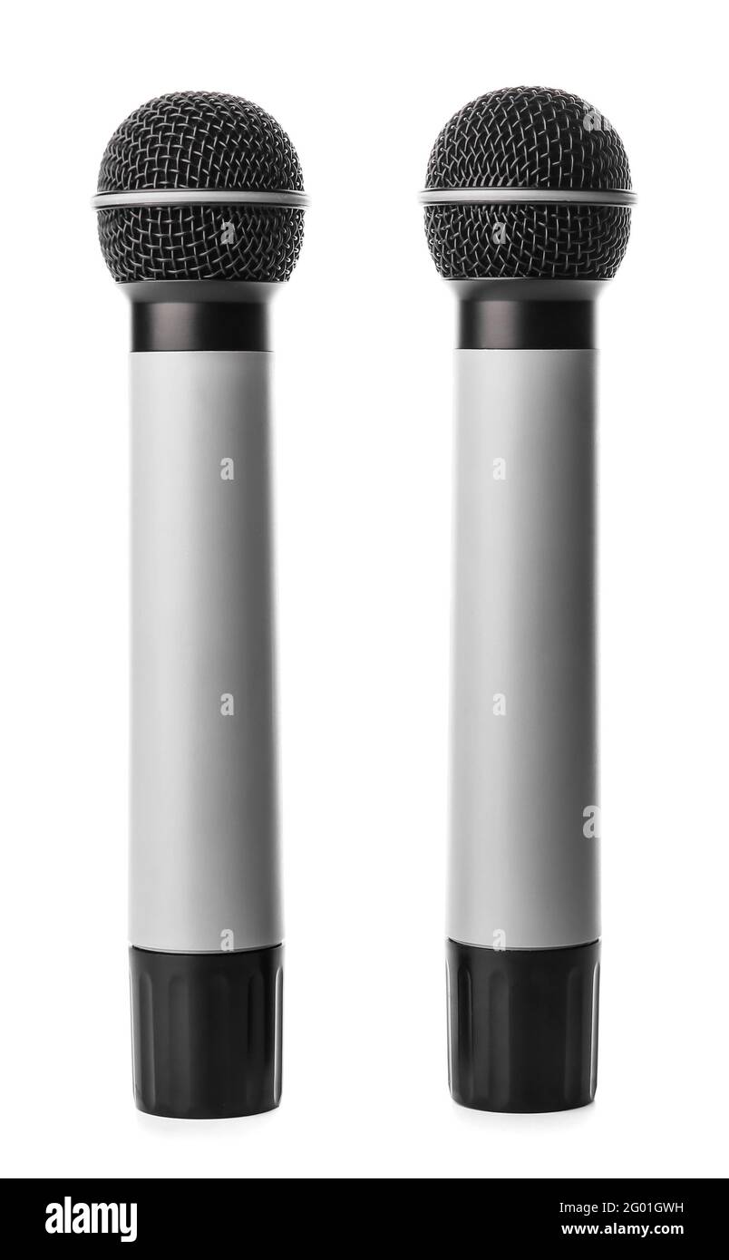 Modern microphones on white background Stock Photo - Alamy