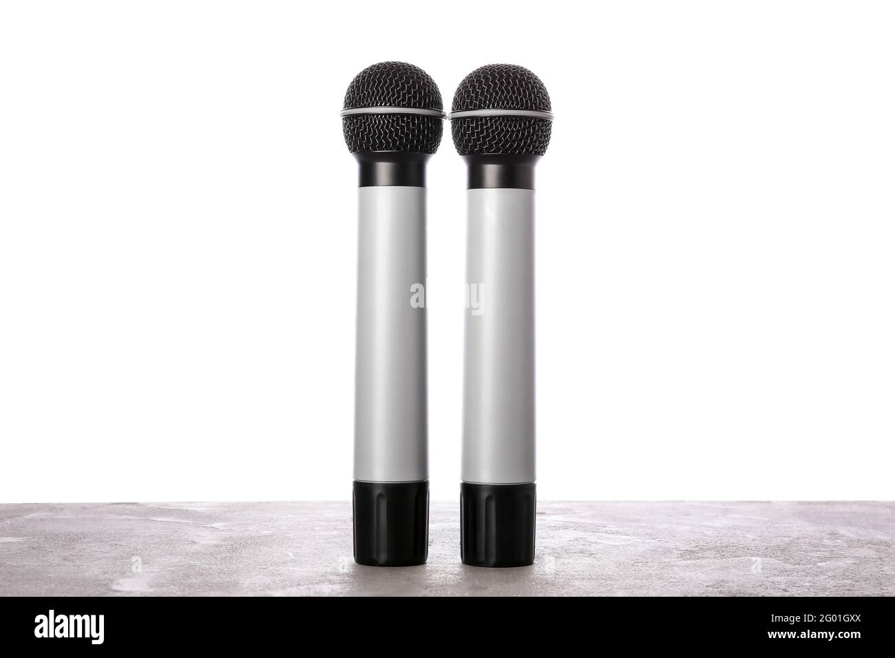 Modern microphones on white background Stock Photo - Alamy