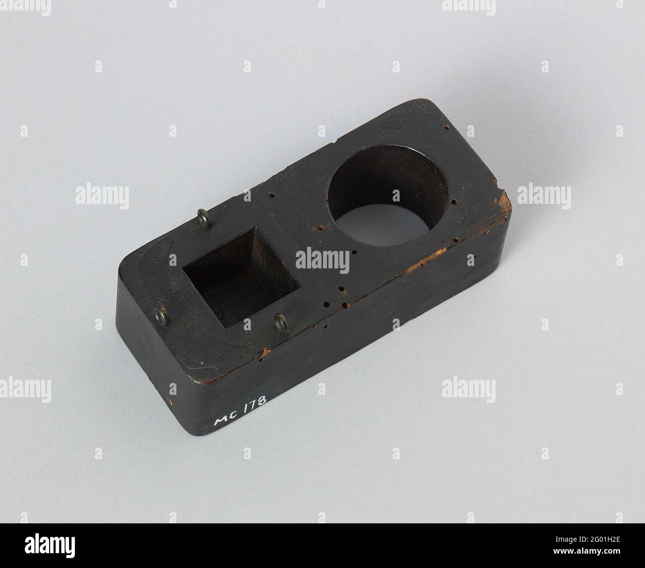 Model or a mast cap. Model of a donkey head of a sloping mast with ...