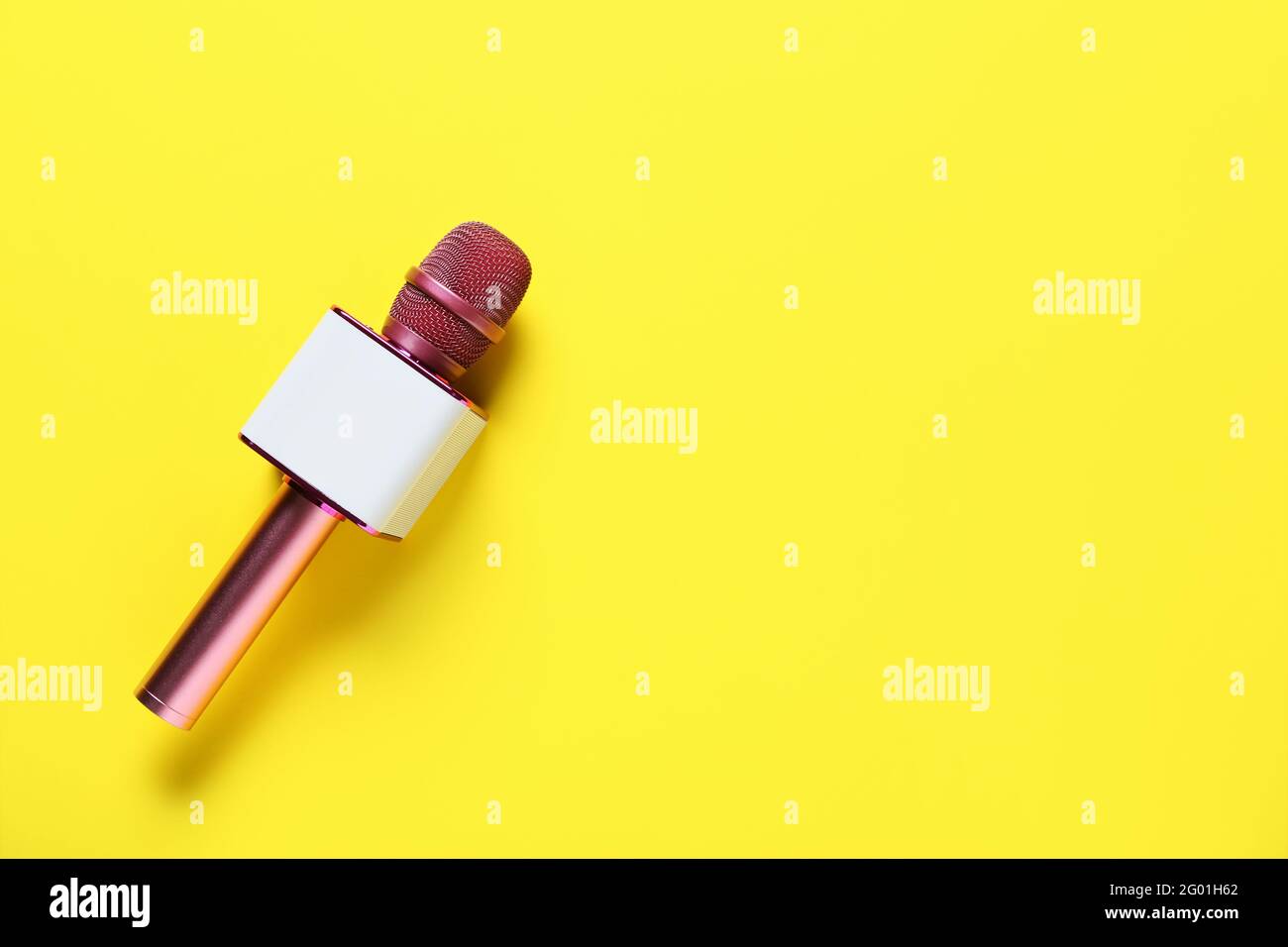 Modern microphone on color background Stock Photo - Alamy