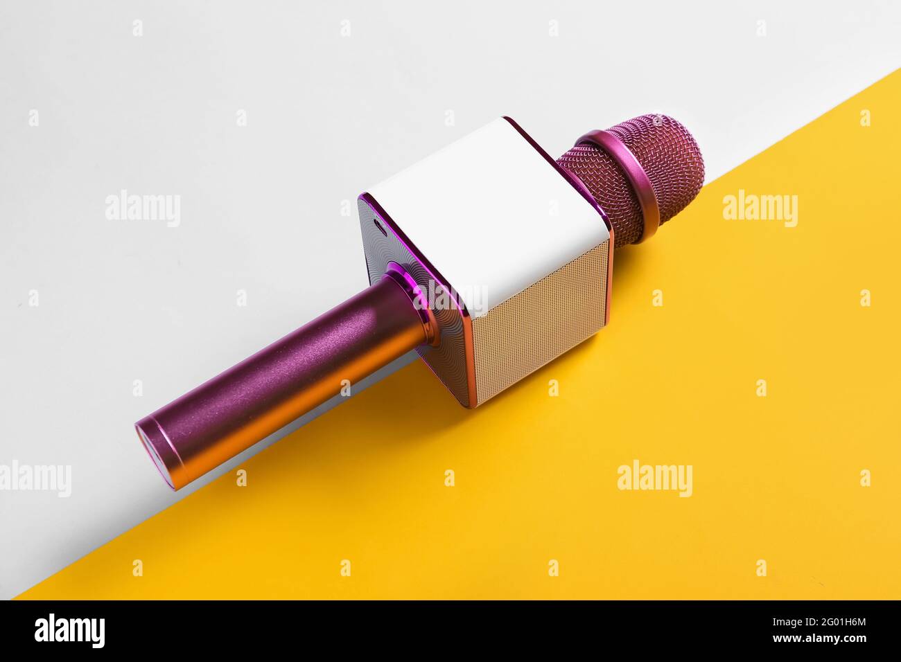 Modern microphone on color background Stock Photo - Alamy