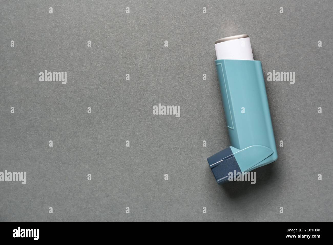 Modern inhaler on grey background Stock Photo - Alamy