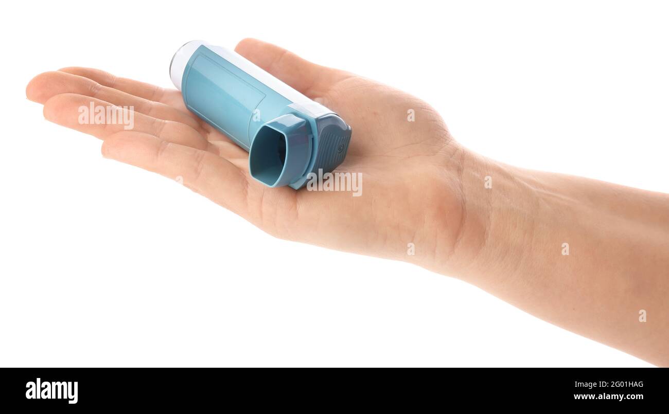 Female hand with inhaler on white background Stock Photo - Alamy