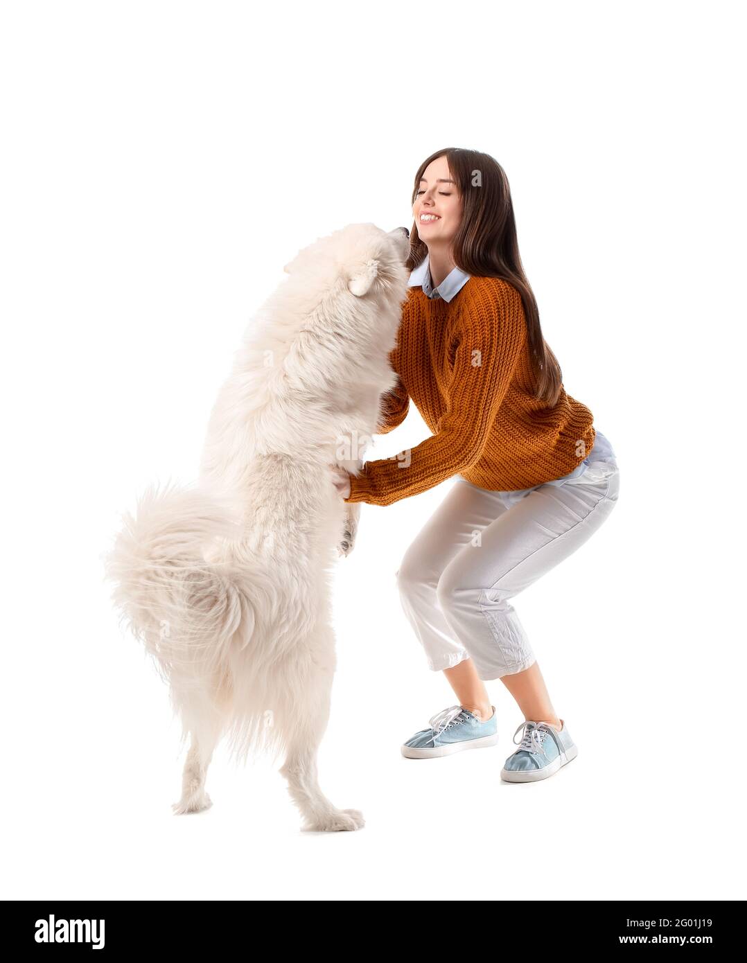 Beautiful woman with cute dog on white background Stock Photo - Alamy