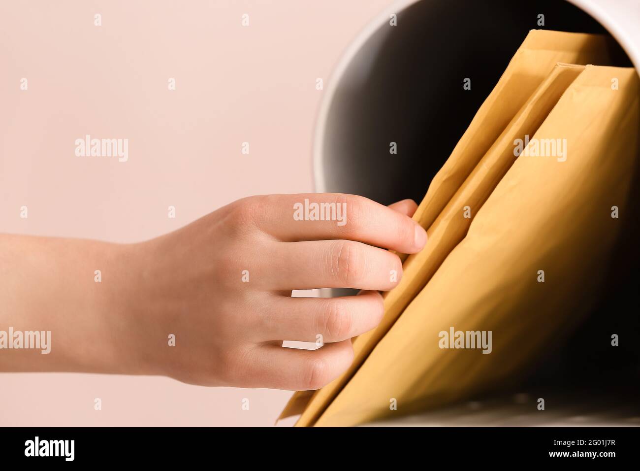 Woman getting letter from box, closeup Stock Photo - Alamy