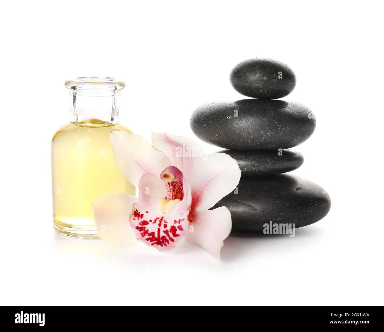 Essential oil on stones Cut Out Stock Images & Pictures - Alamy