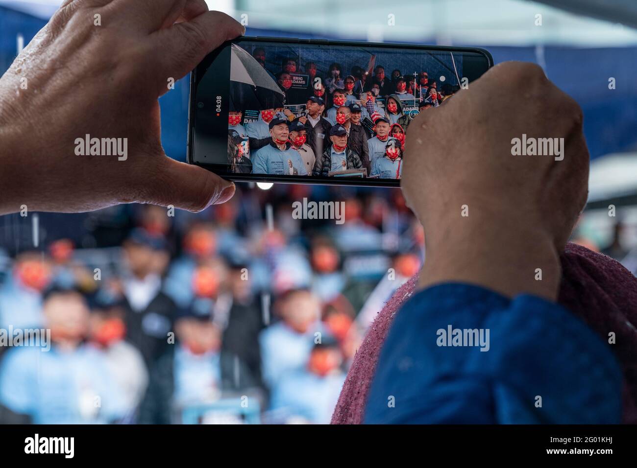 New York, NY - May 30, 2021: Supporter record on cell phone as Eric ...
