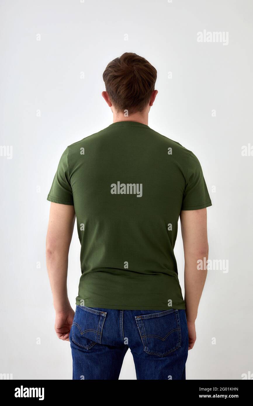 Back view unrecognizable male wearing jeans and casual t shirt standing ...