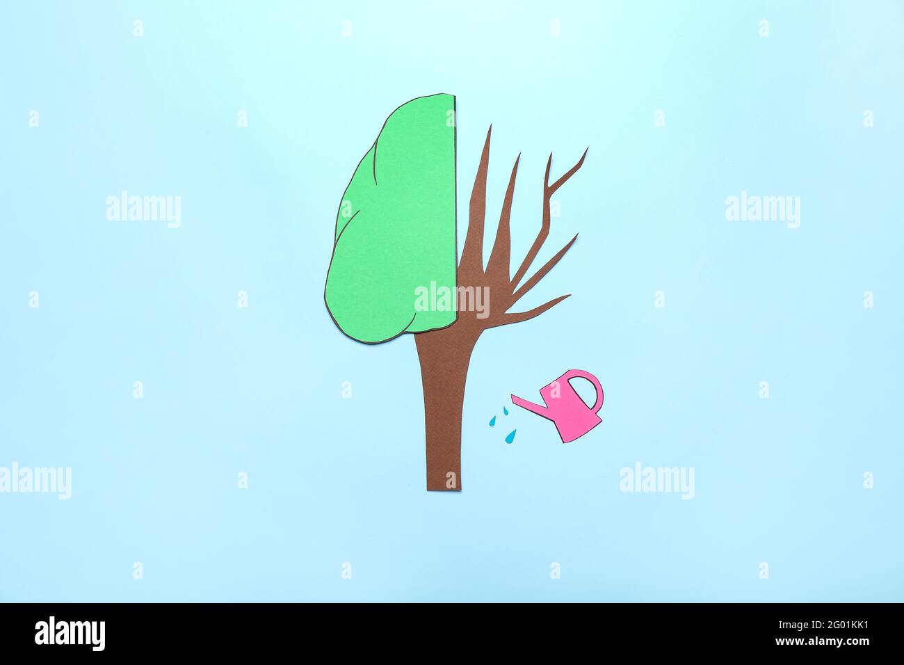 Paper tree with watering can on color background. Ecology concept Stock ...