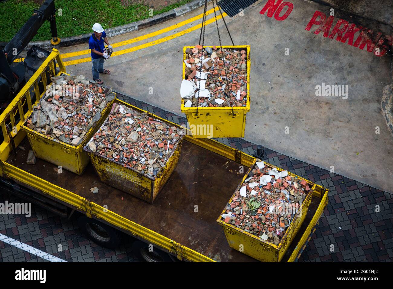 Aerial view of heavy container been lifted and slowly move towards the ...