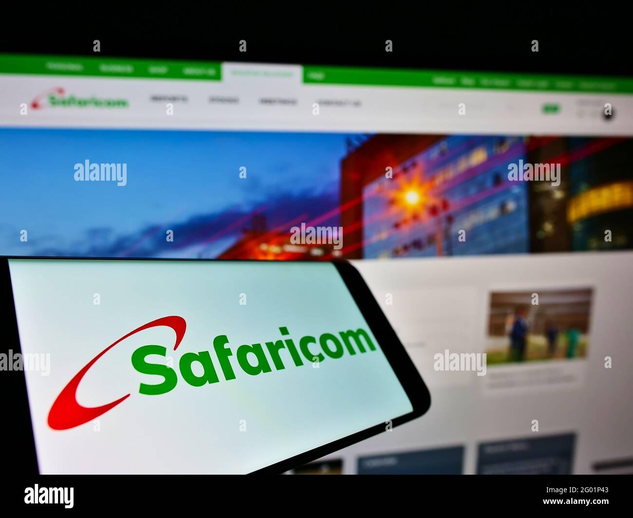 Smartphone with logo of Kenyan mobile network operator Safaricom PLC on ...