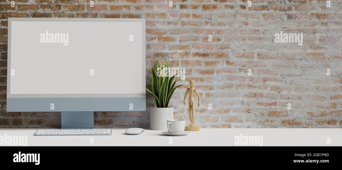 Computer with mock-up screen on white table with decorations, copy ...