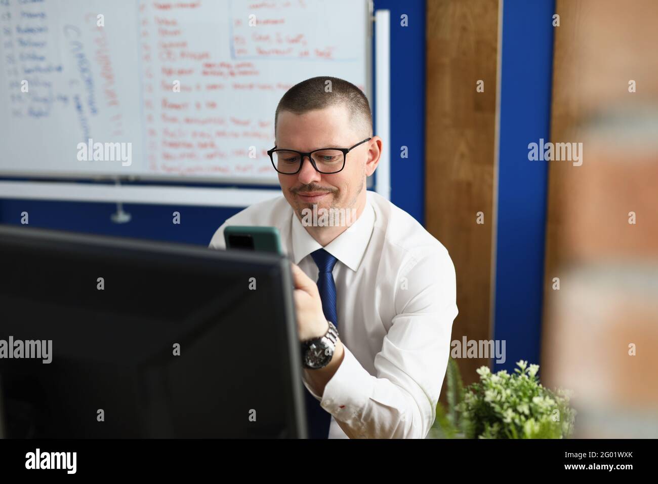 Woman looks computer monitor desk hi-res stock photography and images ...