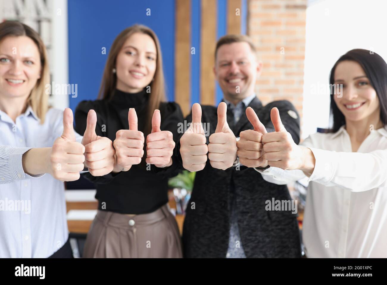 Together show thumbs up hi-res stock photography and images - Alamy