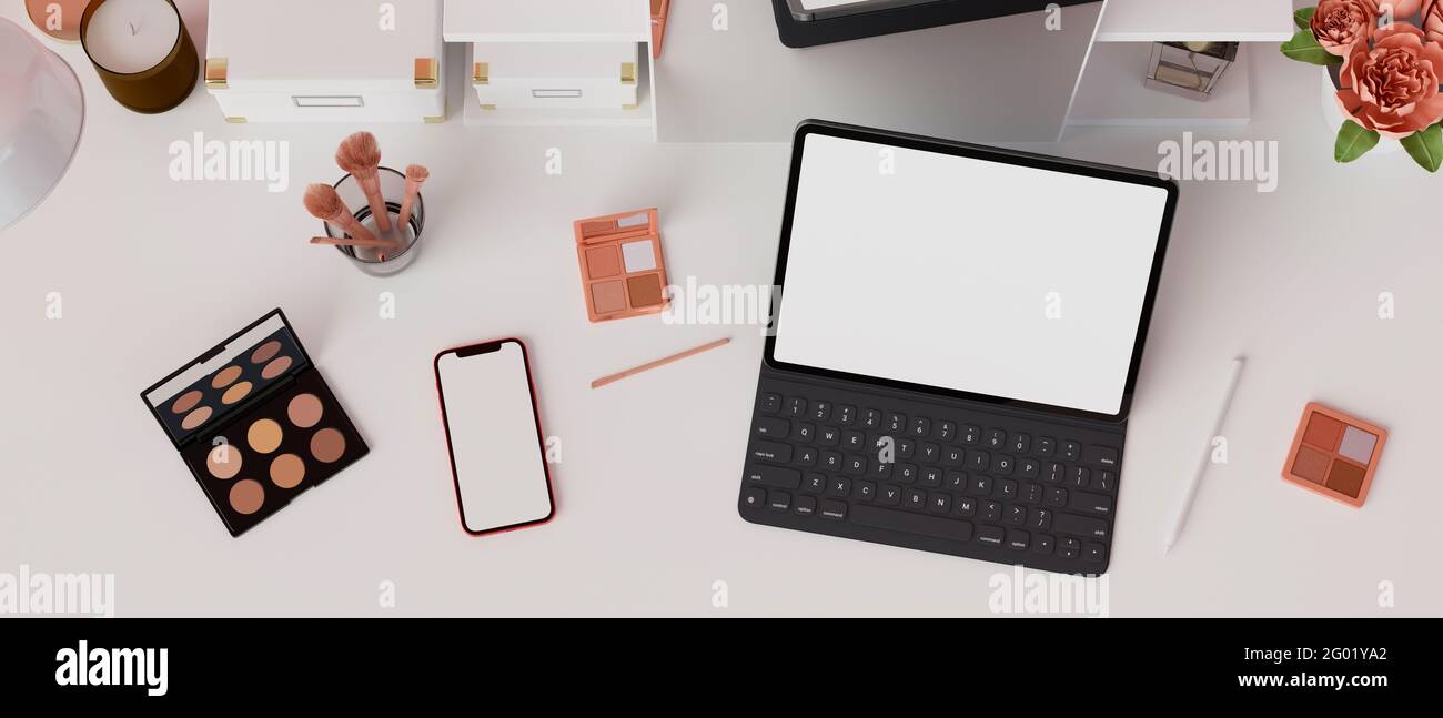 Top view of feminine workspace with digital tablet, smartphone, beauty ...