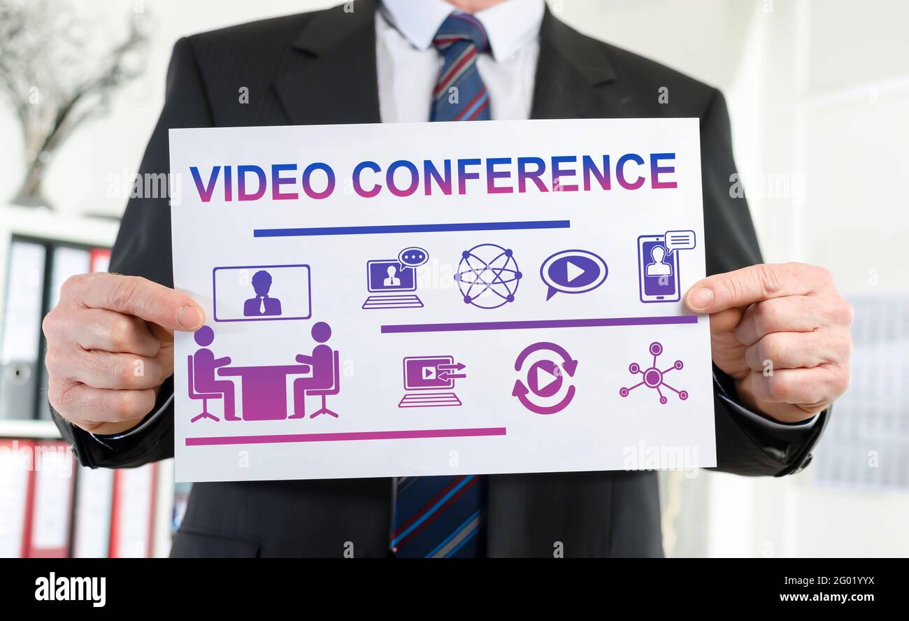 Paper showing video conference concept held by a businessman Stock ...