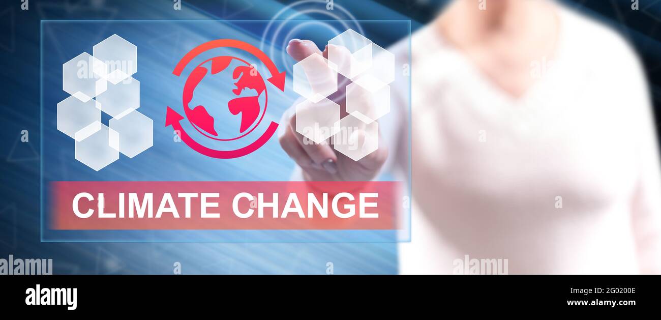 Woman touching a climate change concept on a touch screen with her ...