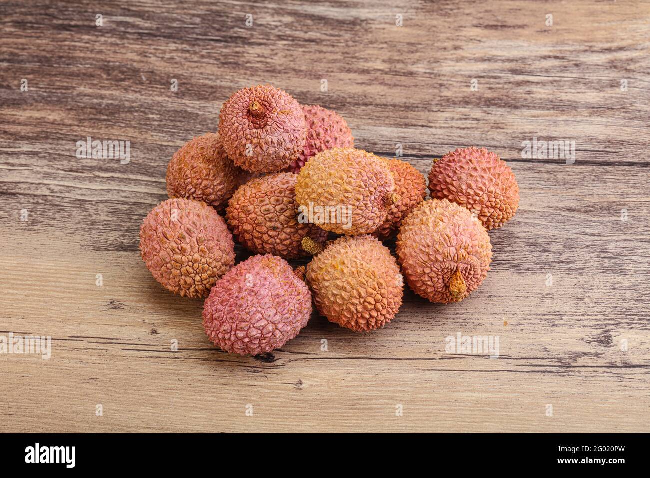 Tropical sweet exotic fruit lychee heap Stock Photo - Alamy