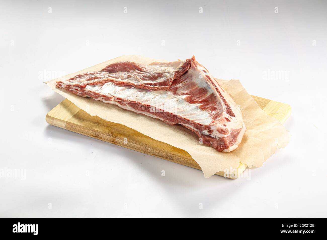 Raw lamb loin rack chop isolated Stock Photo - Alamy