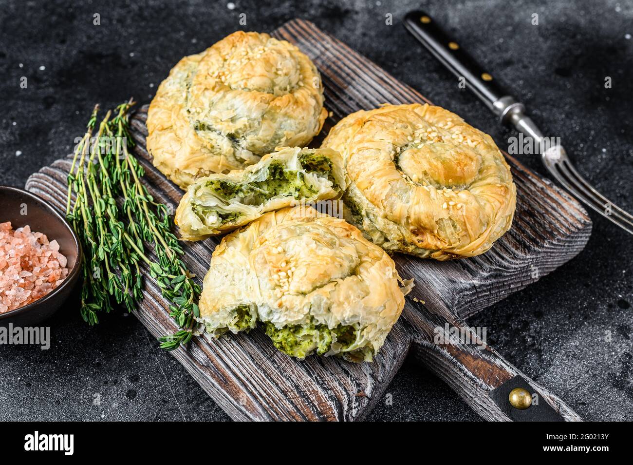 Baked Spanakopita spiral filo pastry puff pie with feta cheese and ...