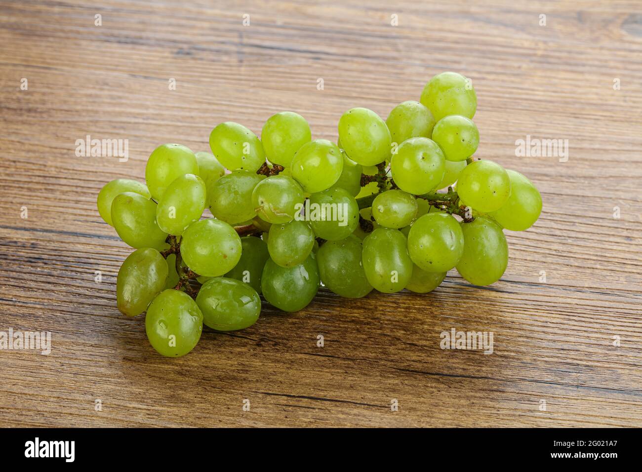 Ripe sweet green grape branch isolated Stock Photo - Alamy