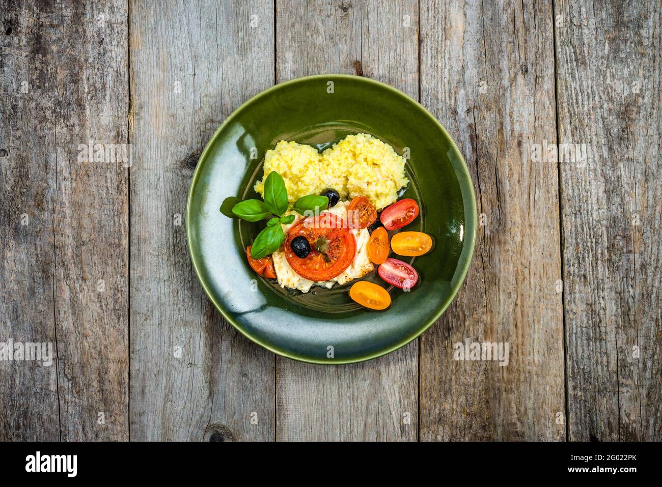 Vegetarian food on plate. Vegetables with couscous, healthy eating ...