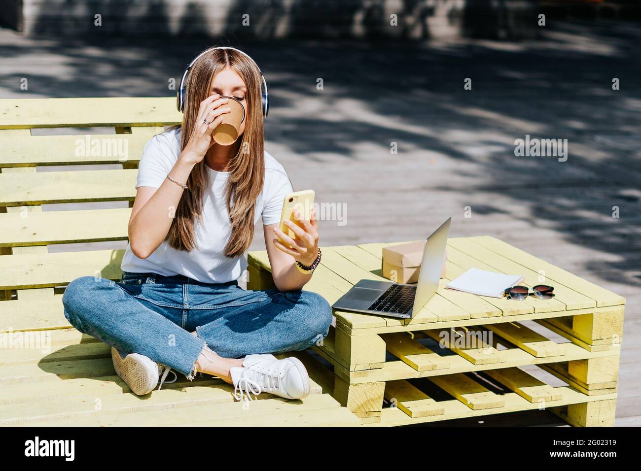 Woman having video call drinking hi-res stock photography and images ...