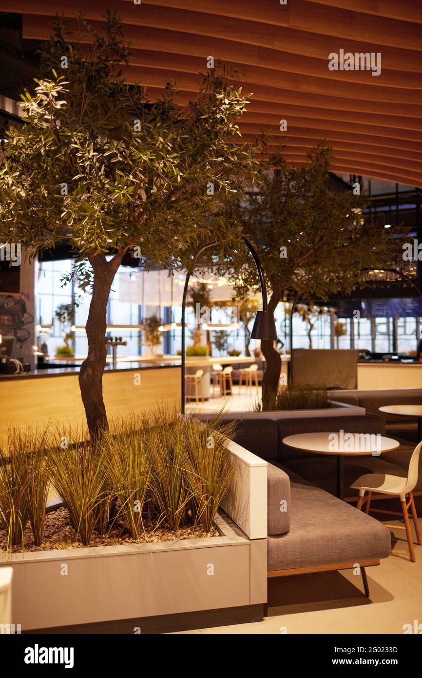 Vertical background image of empty food court interior at modern ...
