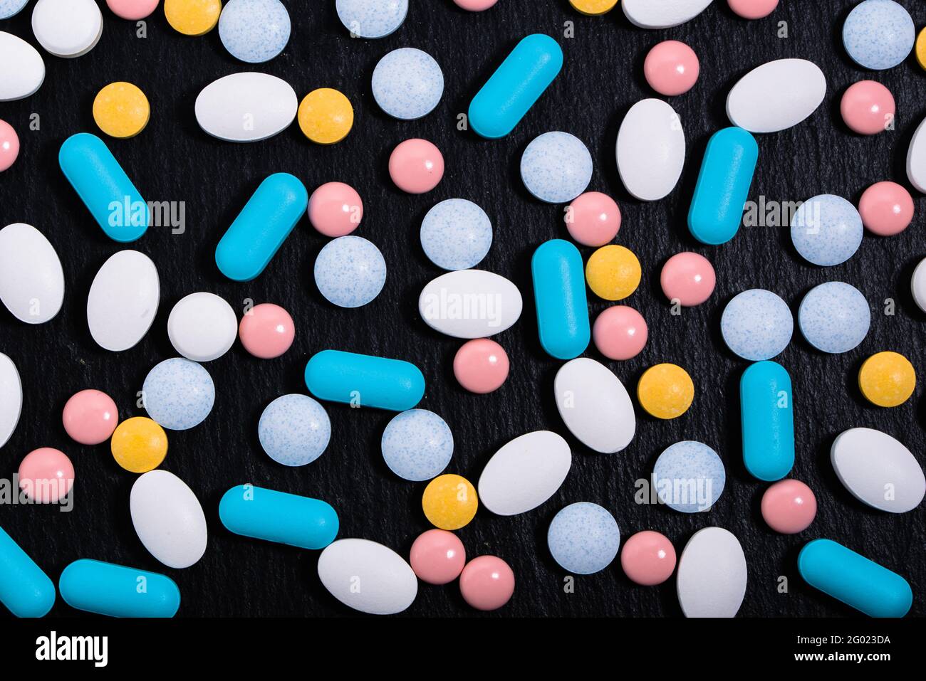 Background with medicines. Pills, tablets, vitamins and supplements on ...