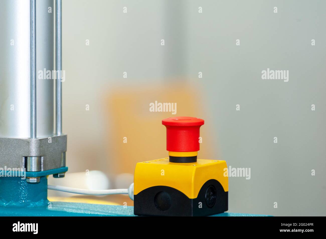 The red emergency button or stop button for Hand press. STOP Button for ...