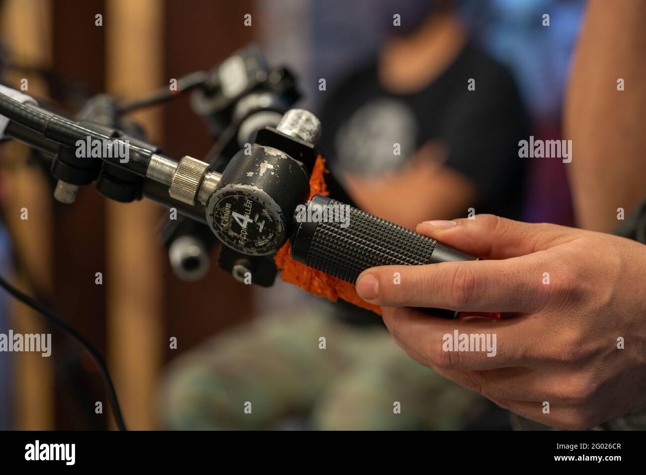 Man holding the camera handler Stock Photo - Alamy