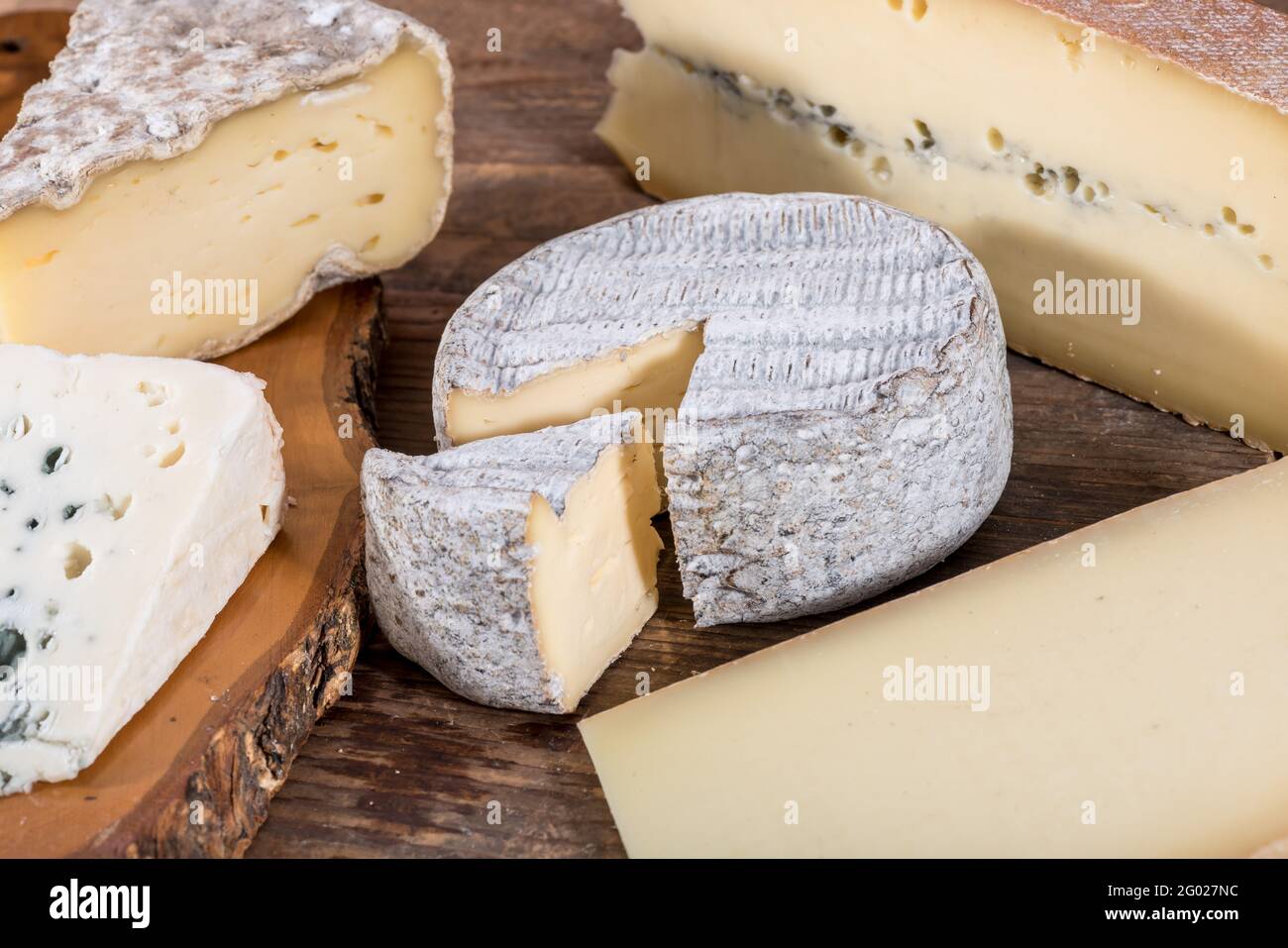 Composition with different varieties of French cheeses Stock Photo - Alamy