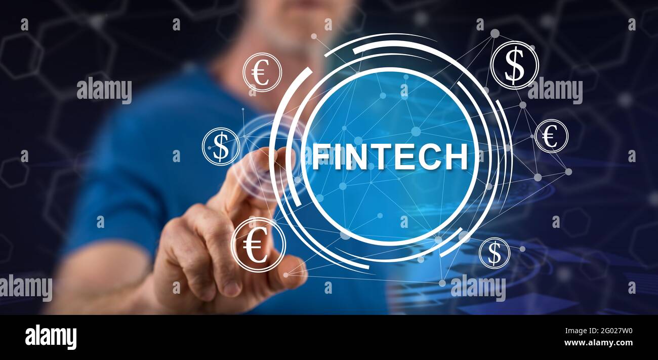 Man touching a fintech concept on a touch screen with his finger Stock ...