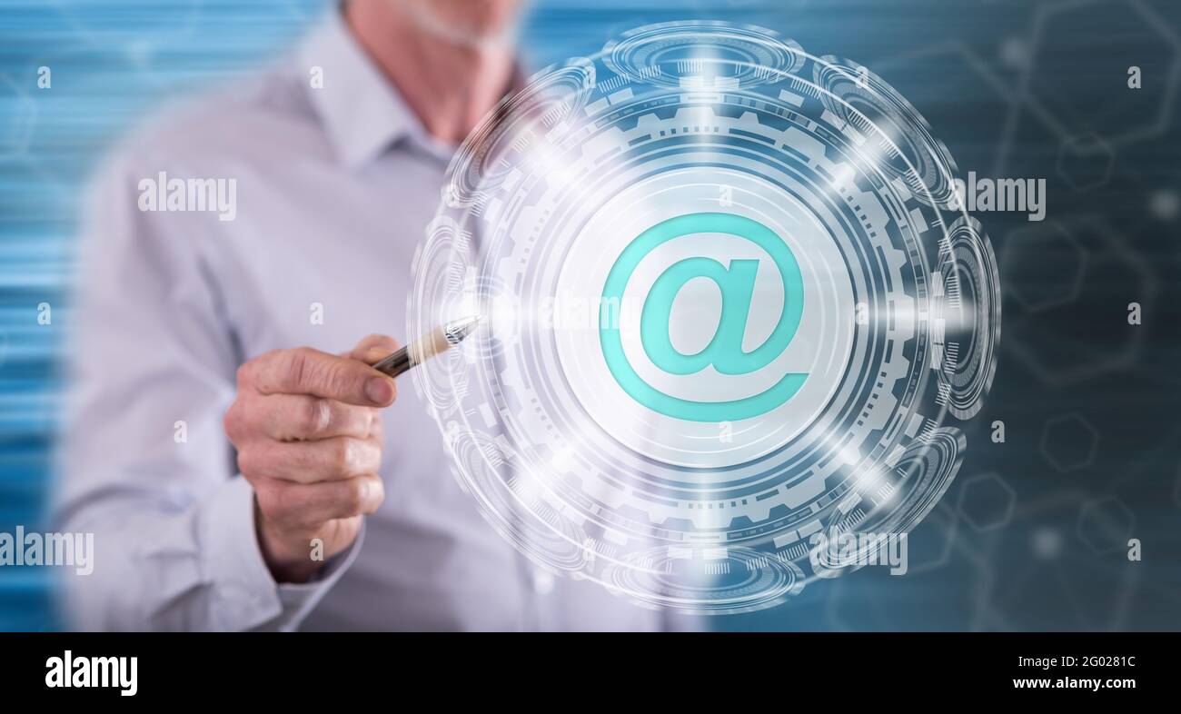 Man touching email concept on a touch screen with a pen Stock Photo - Alamy