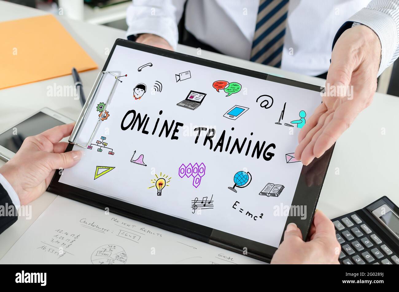 Online training concept shown by a businessman Stock Photo - Alamy