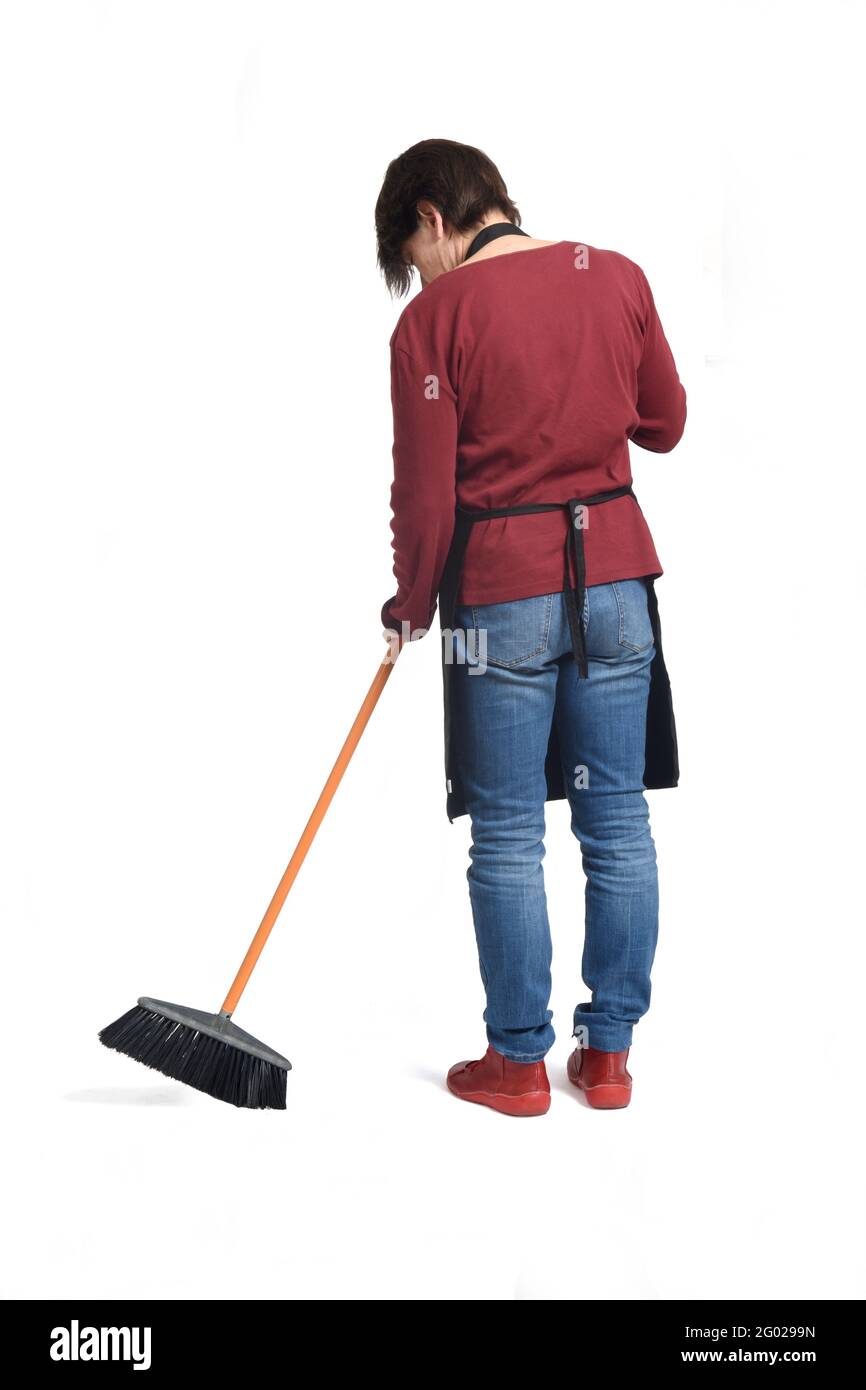 back view of a woman sweeping on white background Stock Photo - Alamy