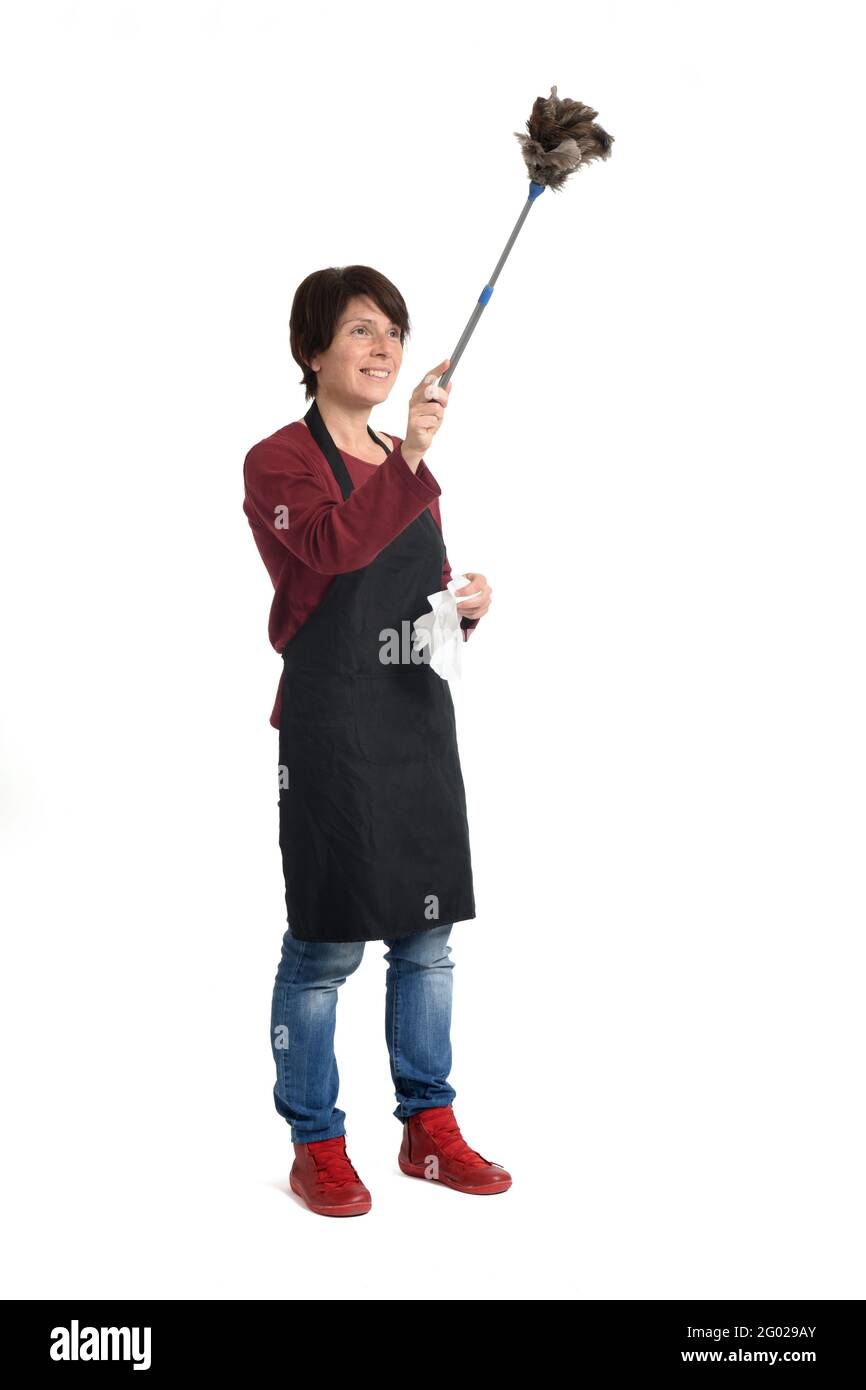 woman with duster and dusting paper on white background Stock Photo - Alamy