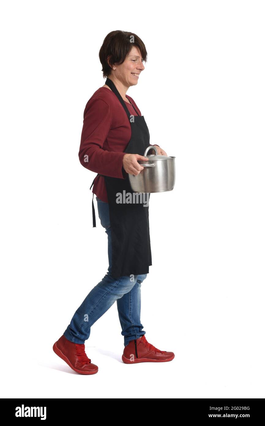 housewife walking with a pot with food on white background Stock Photo ...