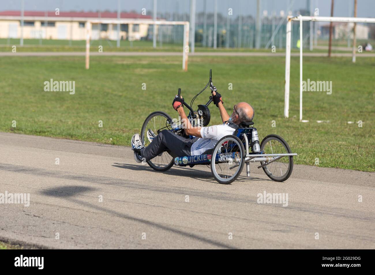 Senior Athlete training with His Hand Bike on a Track Stock Photo - Alamy