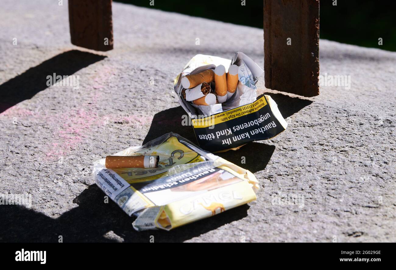 Berlin, Germany. 31st May, 2021. A crumpled cigarette pack, with a few ...