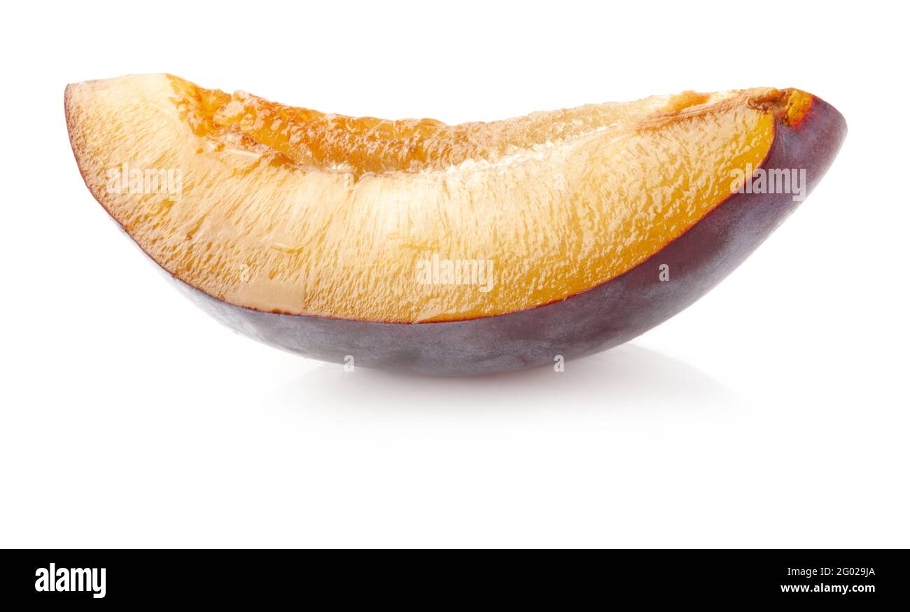 Plum slice isolated on white background Stock Photo - Alamy