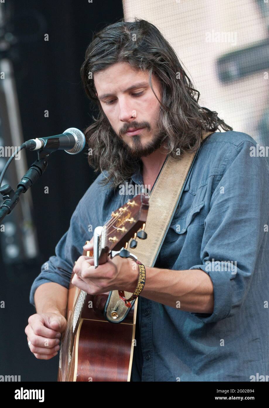 Rich Thomas lead singer and guitarist of Brother and Bones performing ...