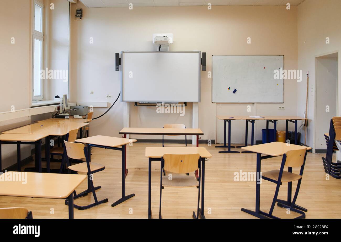 Berlin, Germany. 28th May, 2021. Tables are set up in a classroom at ...
