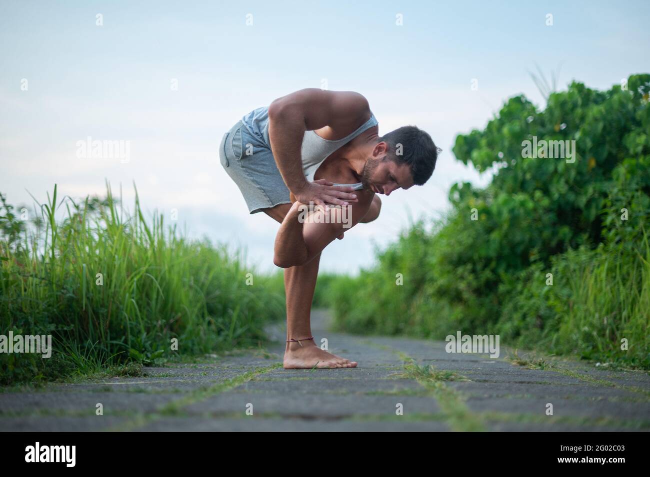 Man practice Yoga practice and meditation outdoor Stock Photo - Alamy