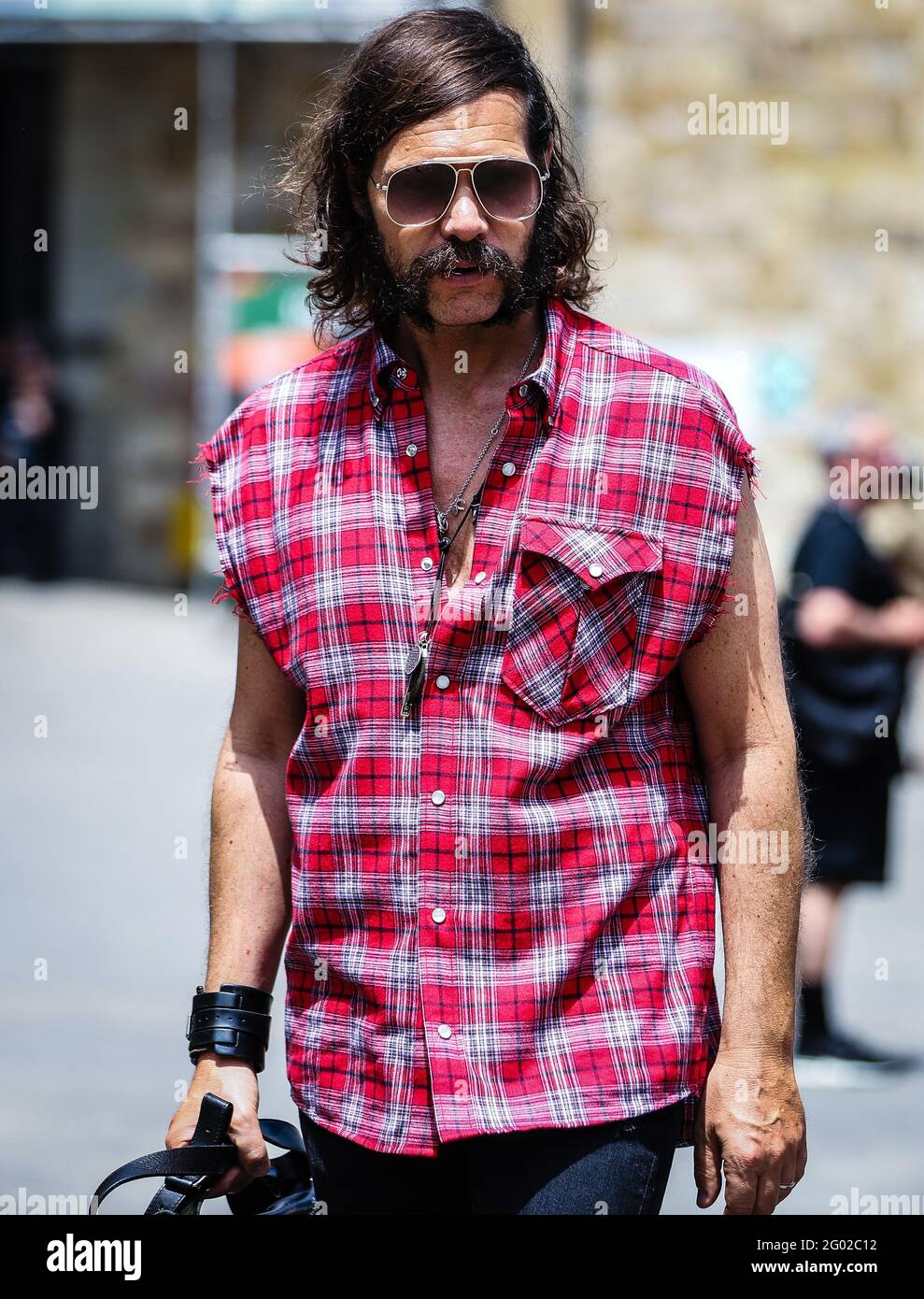 FLORENCE, Italy- June 11 2019: Men on the street in Florence Stock ...
