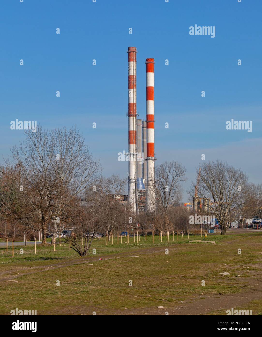 Tall Red and White Chimneys at Industrial Plant Stock Photo - Alamy