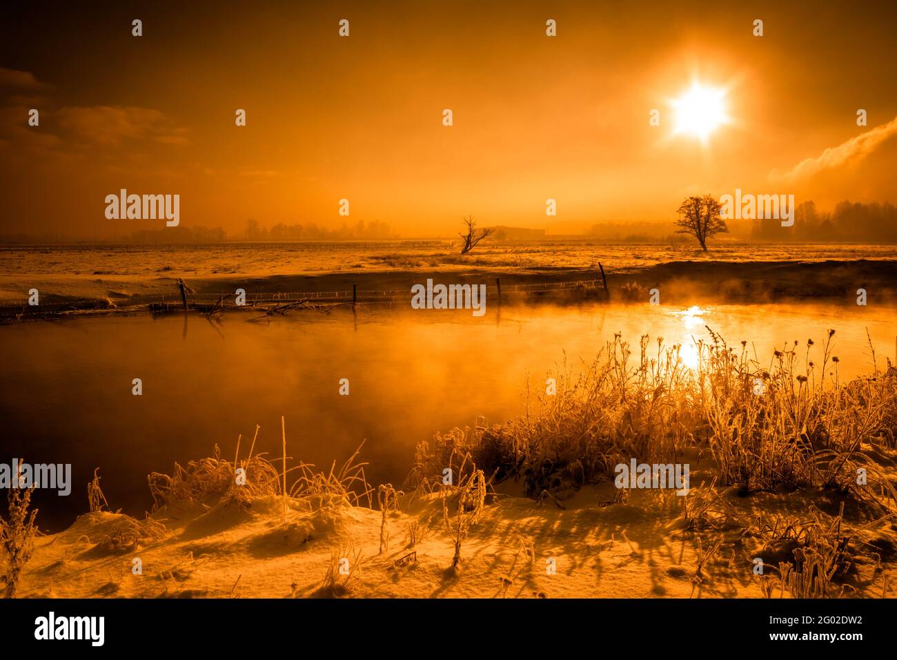 Winter river landscape, moody scenery with morning sun reflection in ...