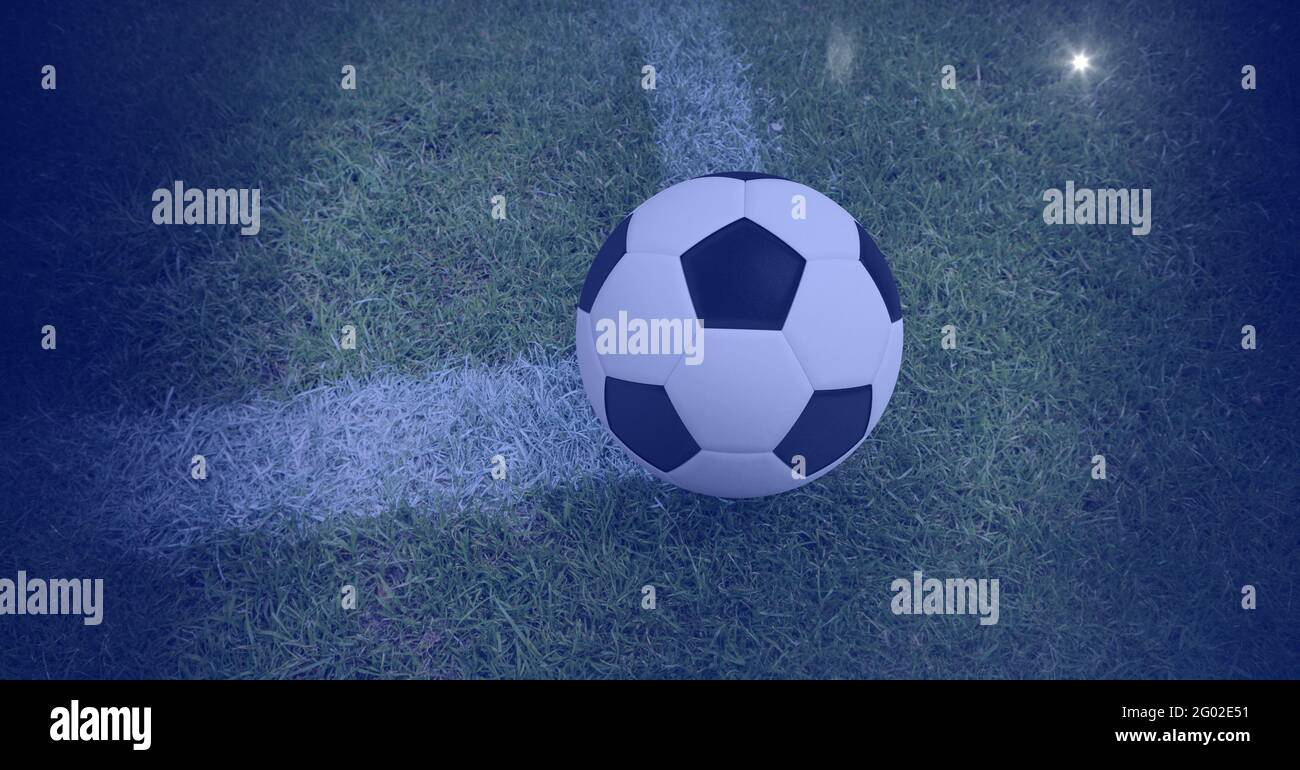 Composition of football on white line on grass pitch Stock Photo - Alamy